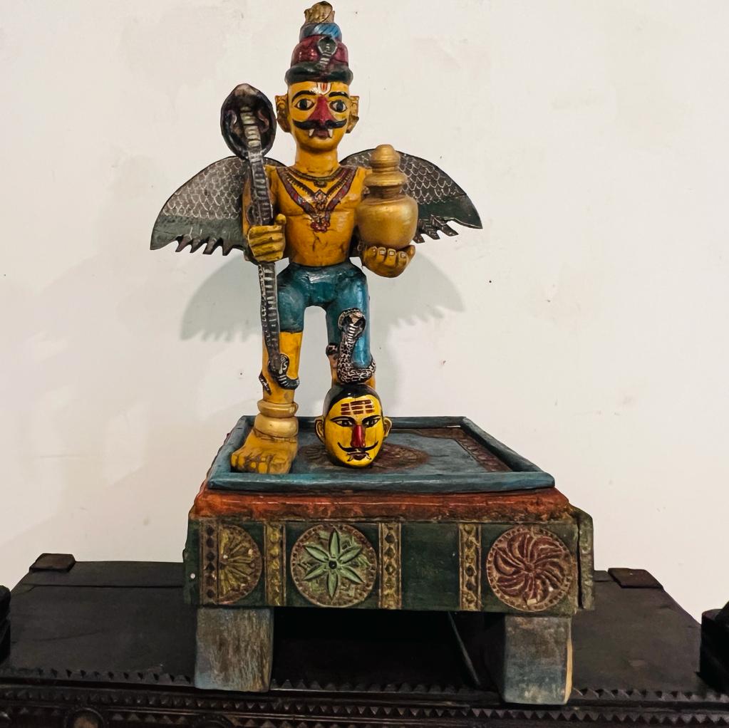 Garuda : Handpainted Wooden Sculpture with unusual Colouring seated on ...