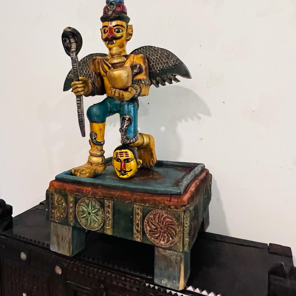 Garuda : Handpainted Wooden Sculpture with unusual Colouring seated on ...